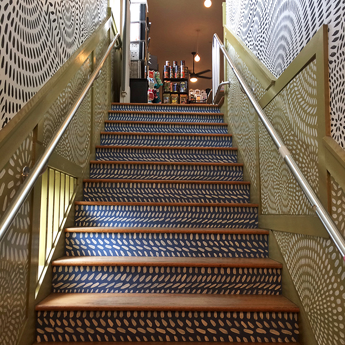 These aren't just stairs but a passage between worlds &ndash; follow the artistic flow upward to discover new dimensions of cultural delight.