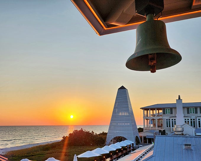 Sunset view: Nature's nightly masterpiece framed by a dinner bell &ndash; the kind of sunset that makes you believe in magic.