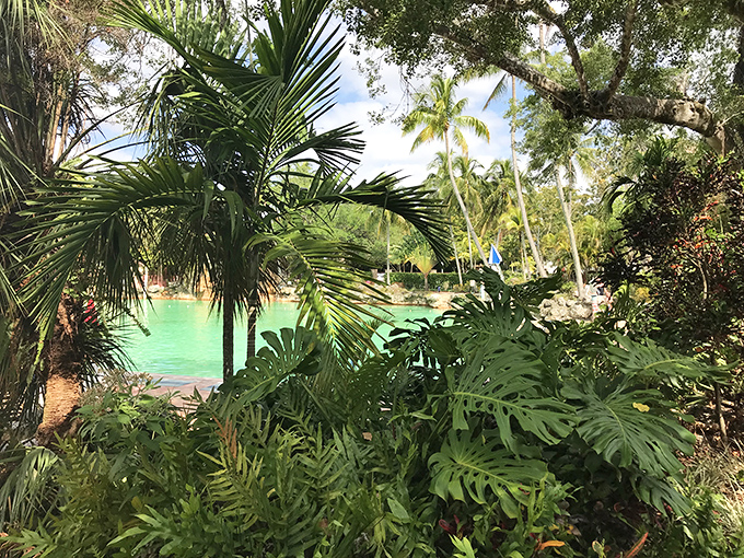 The lush tropical landscaping isn't accidental &ndash; it's a carefully curated jungle that transforms a swimming pool into a scene from "The Blue Lagoon."