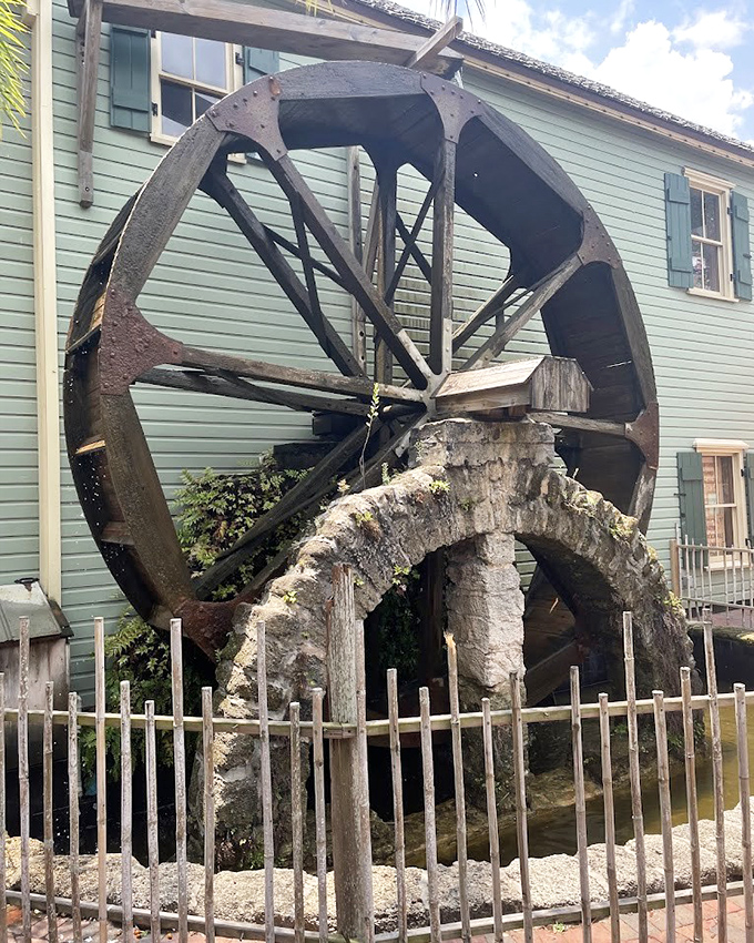 This massive water wheel stands as testament to colonial ingenuity, harnessing natural power long before anyone dreamed of solar panels.