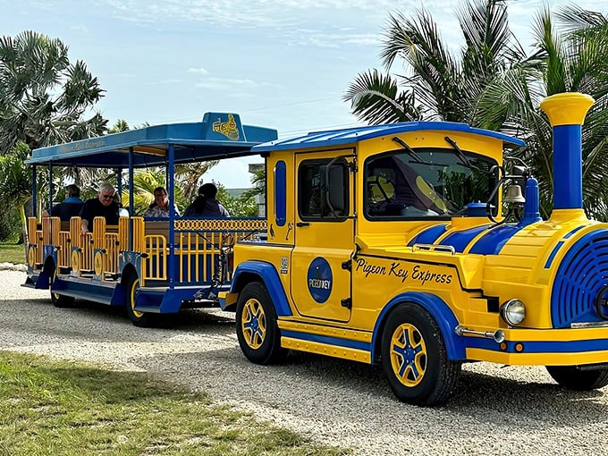 The Express waits for its next group of explorers, its bright colors popping against the neutral tones of gravel and Florida sunshine.