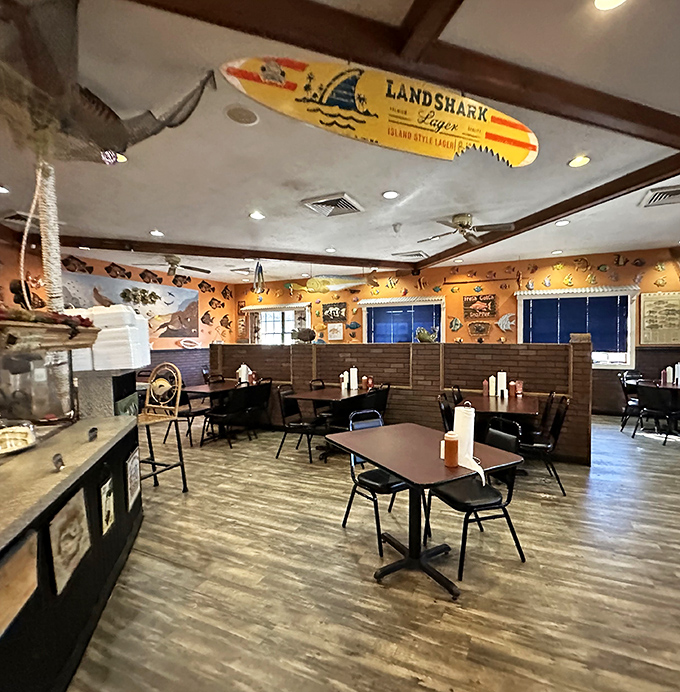 Surfboards and fishing nets transform the spacious interior into a coastal retreat, despite being miles from the nearest beach.