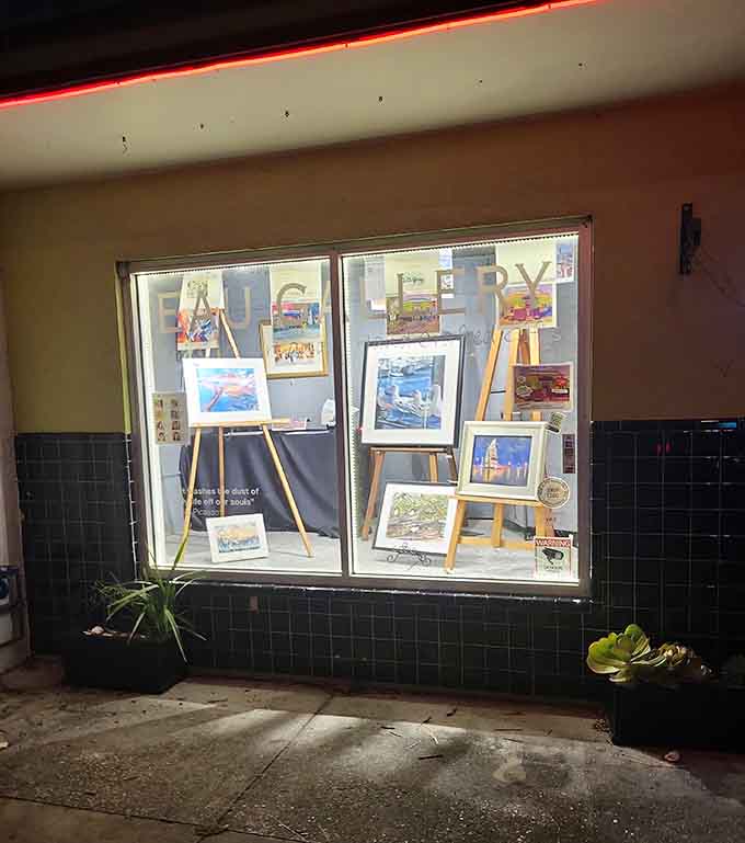 Gallery windows display local artwork on easels, inviting you inside to see what Florida artists create when they're not painting dolphins, refreshingly enough.
