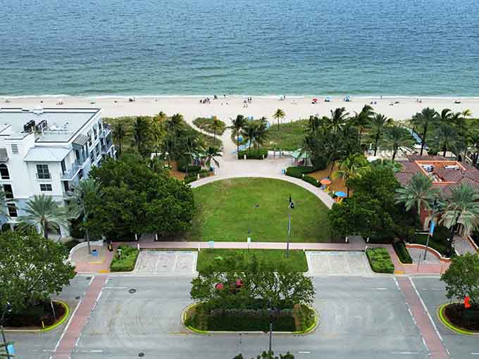 From above, El Prado Park reveals its perfect geometry, where manicured lawns meet wild ocean in a collaboration that somehow just works beautifully.