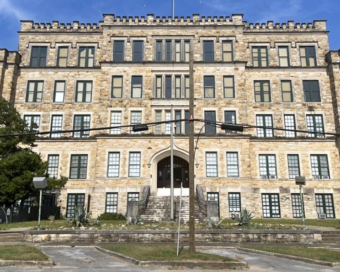 The architectural grandeur of Sacred Heart Hospital stands as a testament to history, now serving slices instead of medicine.