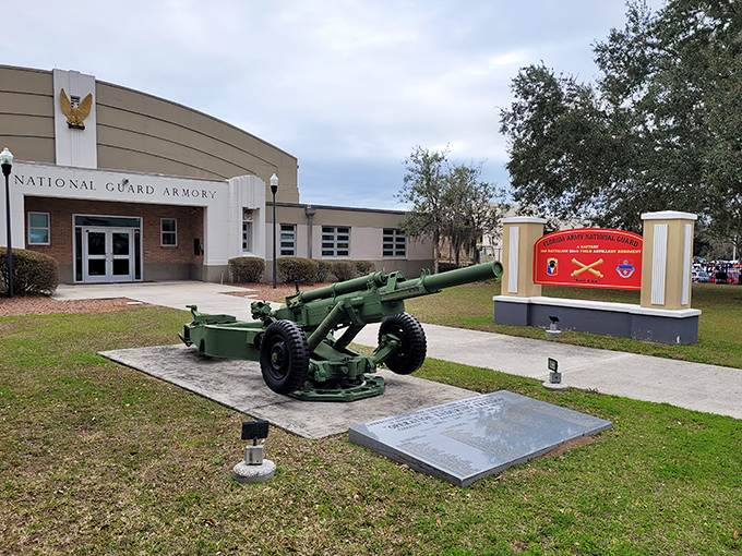 The Florida Army National Guard Armory stands at attention with its vintage artillery display, honoring military service and sacrifice.