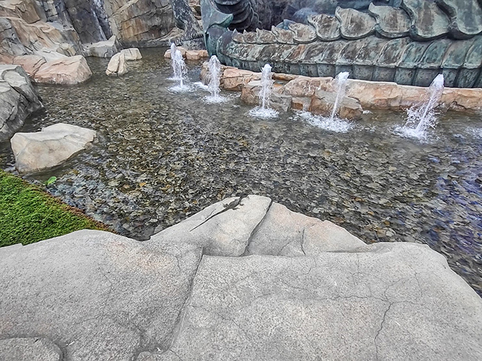 Fountain: Dancing waters add kinetic energy to the static sculpture, creating a multi-sensory experience that delights visitors of all ages.