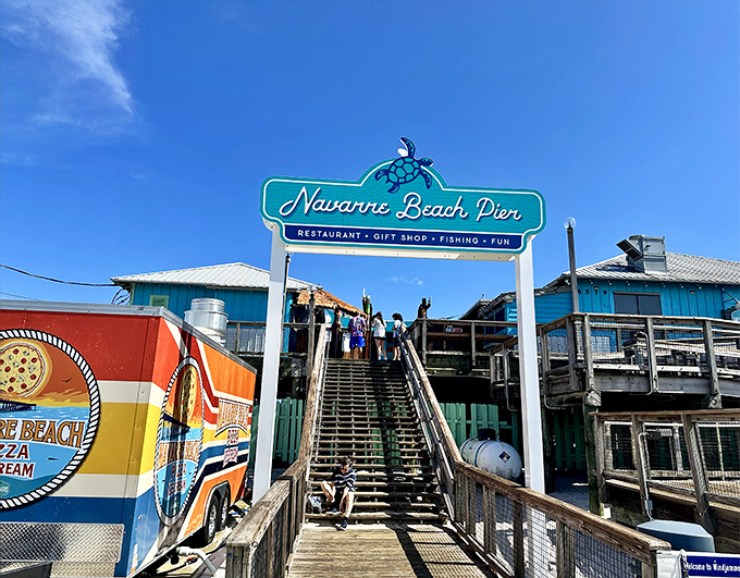 The iconic Navarre Beach Pier sign welcomes visitors to what locals call "Florida's best-kept secret."