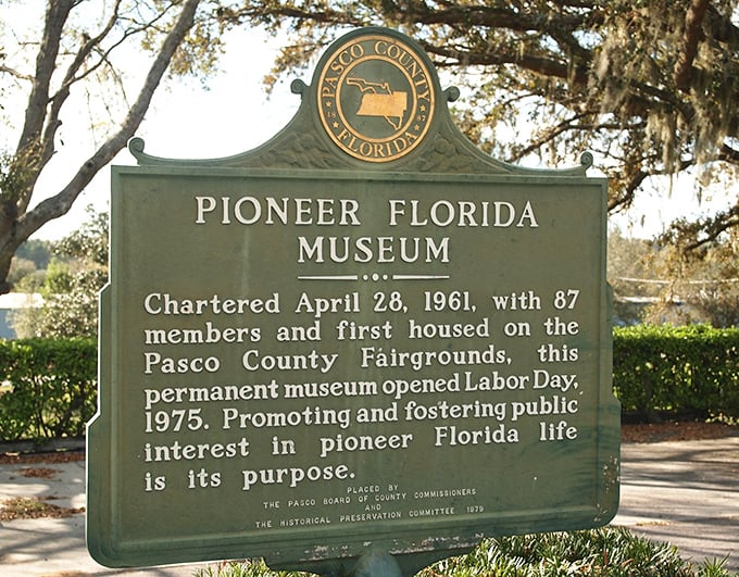 This official historical marker details the museum's founding in 1961 and its ongoing mission to celebrate Florida's pioneer heritage.