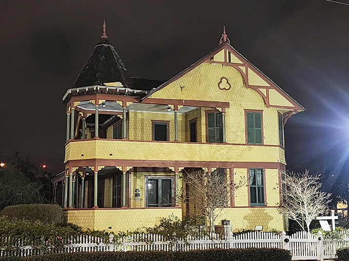 Even at night, the Pritchard House glows with historical significance, its yellow facade capturing streetlights like it's hoarding memories of gaslight.