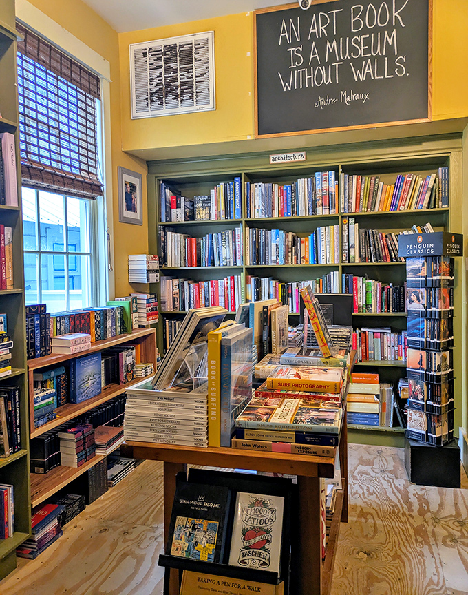 Warm yellow walls embrace visitors in literary sunshine &ndash; this room feels like the physical manifestation of that perfect reading afternoon.