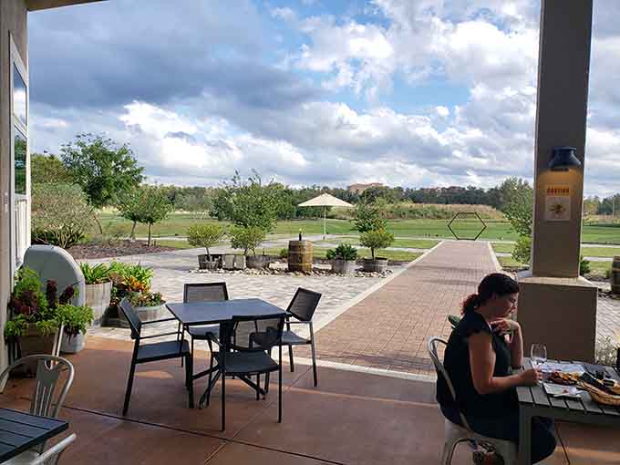 Patio dining with garden views that'll make you forget you're in Kissimmee and convince you you've been transported to wine country.
