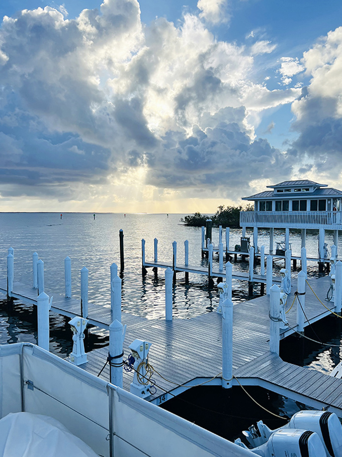 As day surrenders to evening, Boca Grande's marina transforms into a watercolor painting where boats rest after adventures on Charlotte Harbor.
