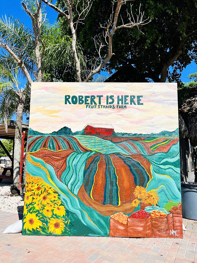 A vibrant hand-painted sign captures the essence of this beloved institution &ndash; where fruit is elevated to art form.