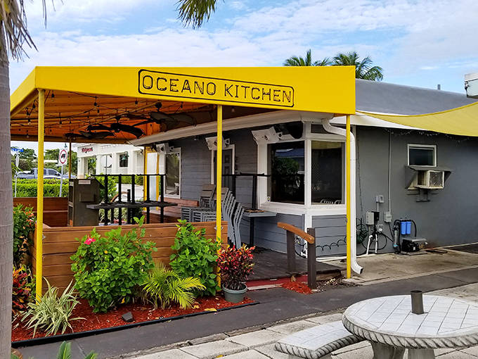 Oceano Kitchen's cheerful yellow awning disguises a culinary powerhouse serving sophisticated plates from humble surroundings.