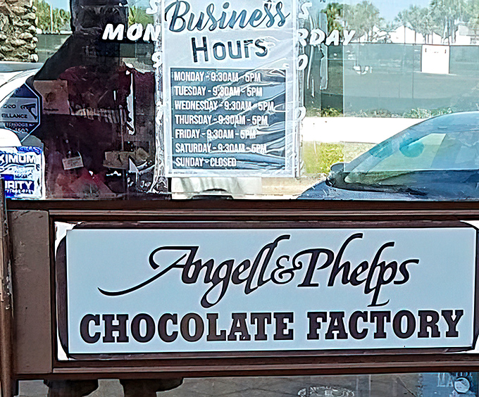 Opening Hours: The sign reveals when you can get your chocolate fix – memorize these hours like your life depends on it.