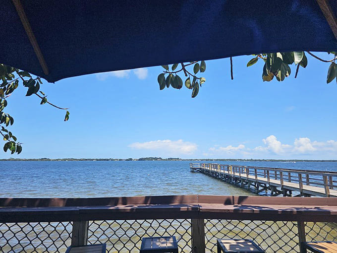 That view across the Indian River Lagoon reminds you why waterfront dining beats a windowless chain restaurant every single time, no contest.
