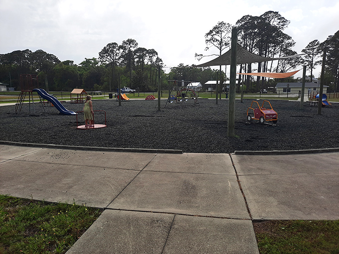 The local playground becomes community central as evening approaches – where kids play while parents exchange the day's stories.