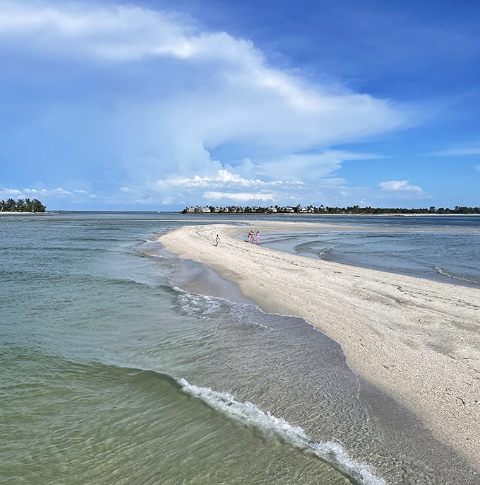 This slender strip of paradise stretches between waters, creating a postcard-perfect scene that explains why visitors become repeat offenders.