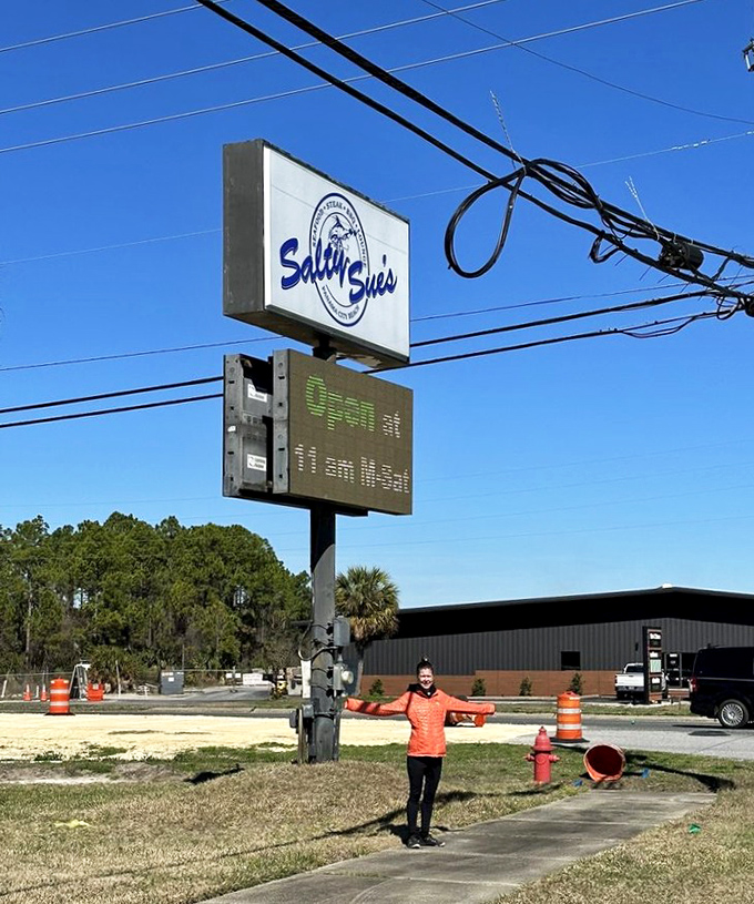 The iconic Salty Sue's sign stands as a beacon for hungry travelers seeking authentic coastal flavors.