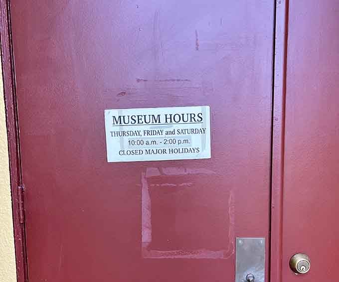 Museum hours are posted clearly because nothing's worse than showing up excited about history only to find a locked door instead.