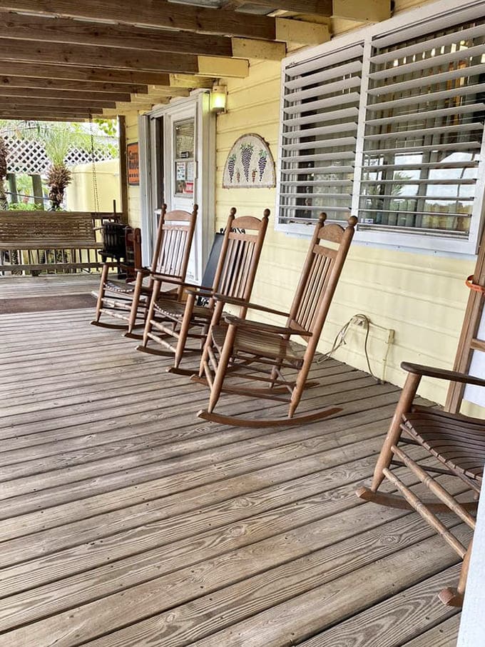 Rocking chairs on the porch offer the perfect spot for contemplating life's big questions, like "Should I have another glass?"