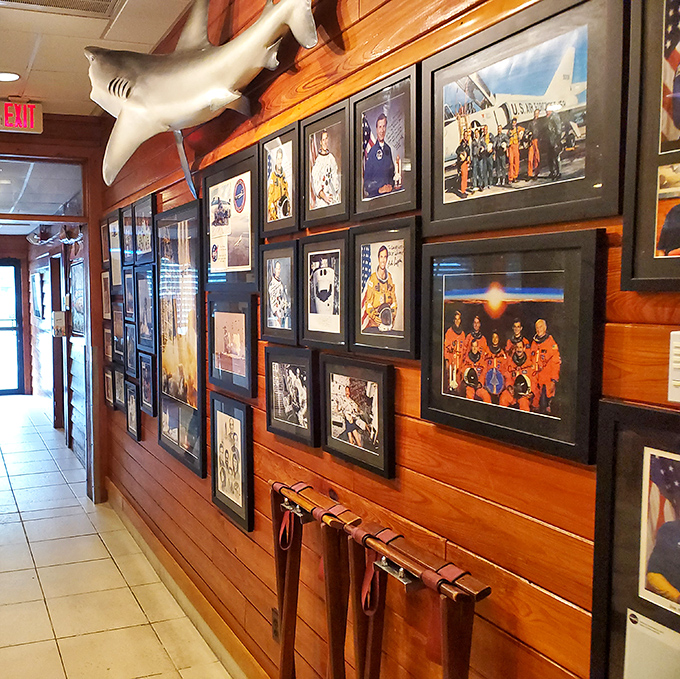 The wall of fame showcases space program memorabilia &ndash; a nod to neighboring Kennedy Space Center and the restaurant's Space Coast heritage.