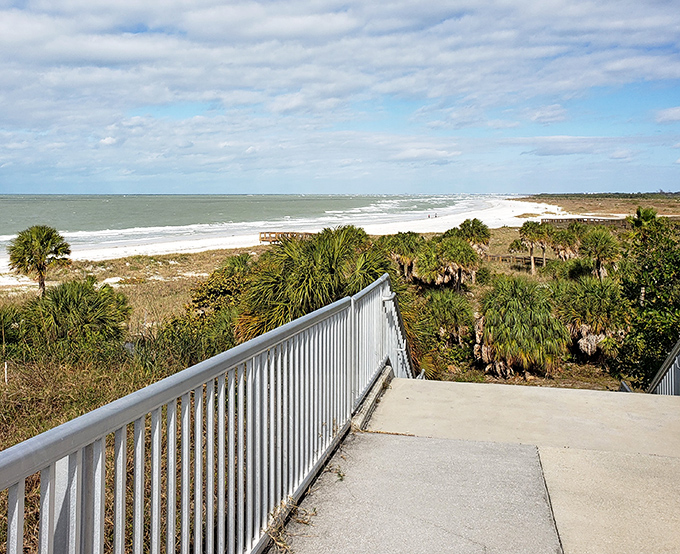 From this elevated perch, the Atlantic stretches endlessly, a blue canvas dotted with the white brushstrokes of breaking waves.