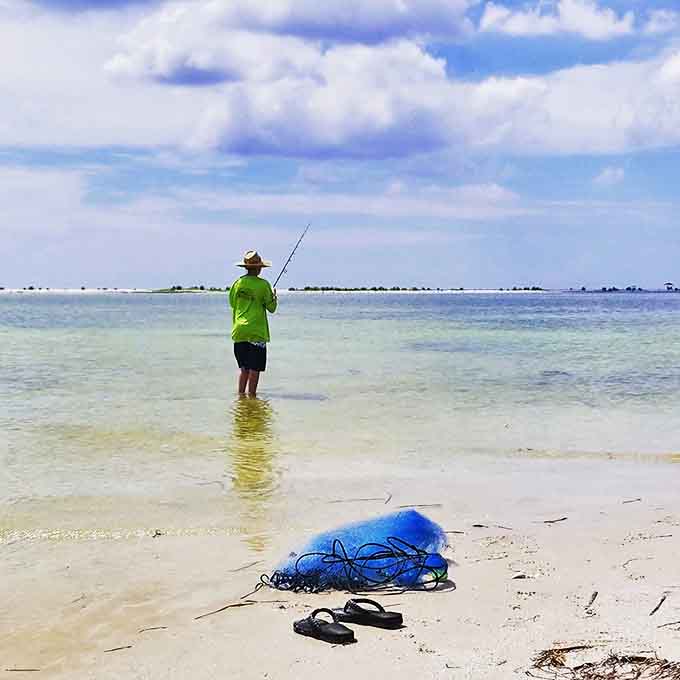 The patient fisherman knows the secret: sometimes the best catch isn't what's on your line, but the moment of perfect stillness while waiting.