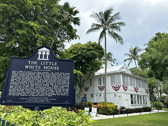 This historical marker details the significance of the Little White House, where the weight of presidential decisions contrasted with the lightness of island living.