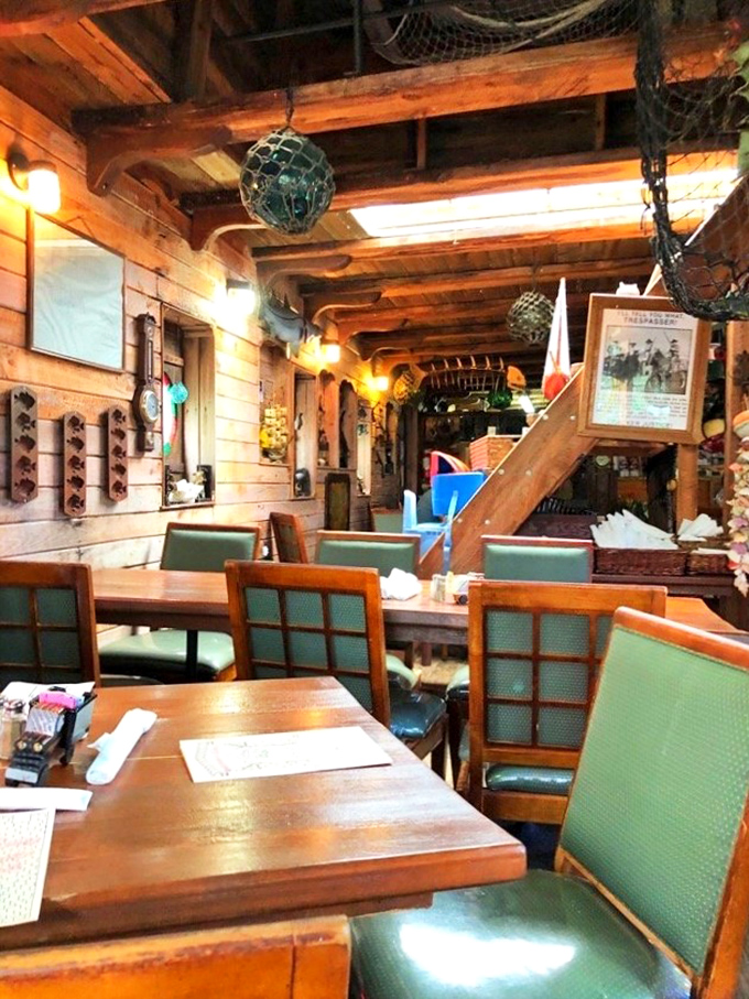 Nautical touches abound in the dining room &ndash; fishing nets and wooden beams creating an atmosphere that's both cozy and theatrical.