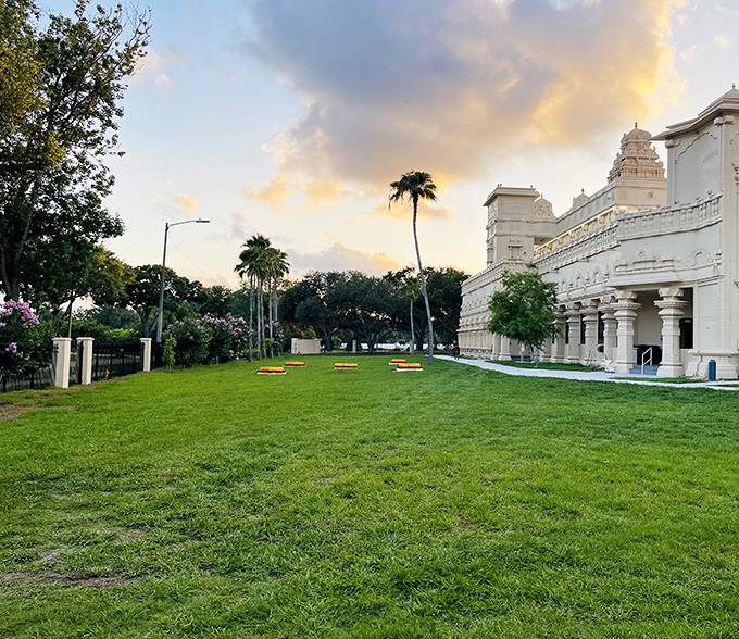 Expansive grounds surrounding the temple provide space for community gatherings, with the manicured lawns hosting everything from yoga classes to cultural festivals.