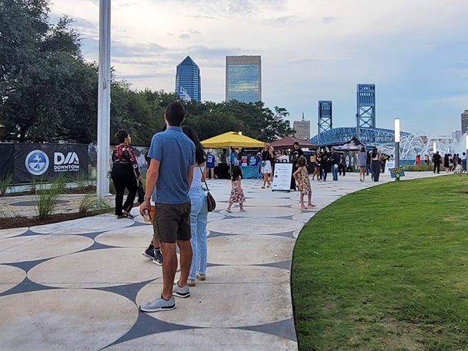 Visitors stroll along the newly renovated Southbank Riverwalk, where weekend markets and food vendors create a festive community atmosphere.