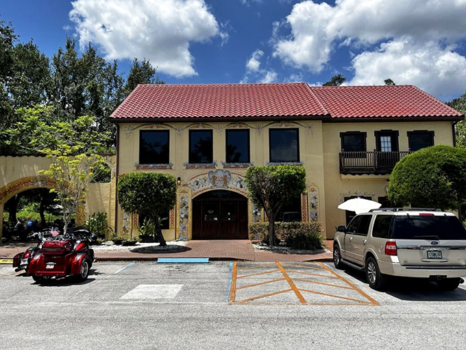The parking area and exterior show this isn't some fancy tourist trap, just an honest bakery serving honest food in a genuinely charming setting.