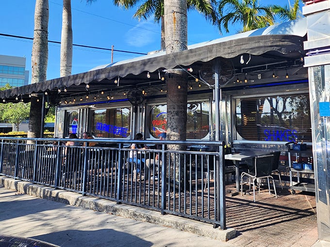 The outdoor patio merges mid-century charm with Florida sunshine, creating the perfect spot to enjoy your shake while watching the world stroll by.