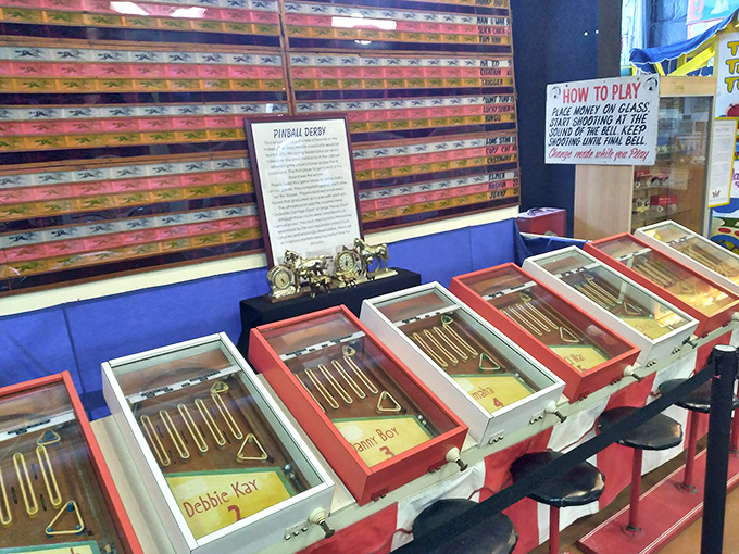 The Pinball Derby display features vintage tabletop games where players tested their skill and luck for prizes now lost to time.