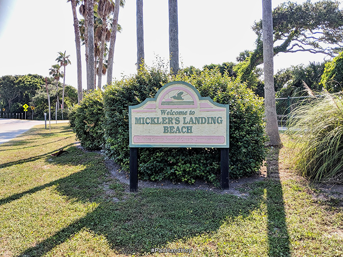 The welcoming committee: Mickler's Landing's charming entrance sign promises treasures beyond the dunes.
