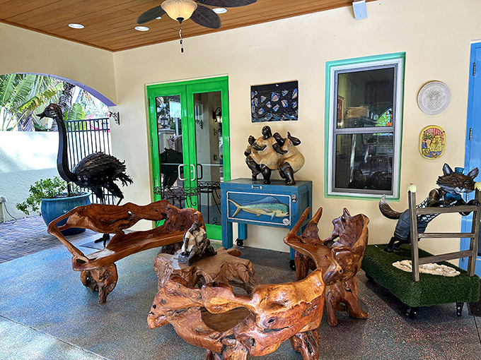 Natural wood furniture and sculptures demonstrate how creativity transforms the ordinary into extraordinary, bringing the outdoors inside this eclectic space.