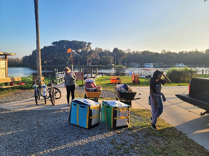 Camping prep: Families unload for an overnight adventure where the only "all-inclusive" amenity is stars overhead. 
