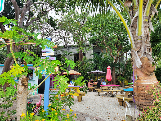 Picnic tables nestled among palms create an oasis of calm amid the artistic chaos&mdash;the perfect spot to contemplate your next quirky purchase.