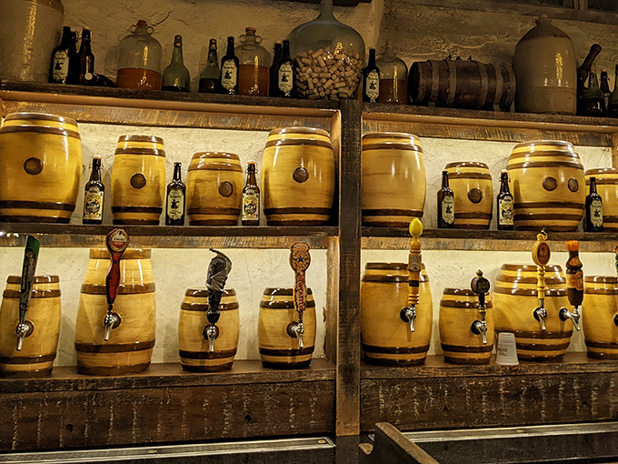 Wooden barrels line the walls, their taps promising magical brews that range from kid-friendly Butterbeer to more potent adult concoctions.