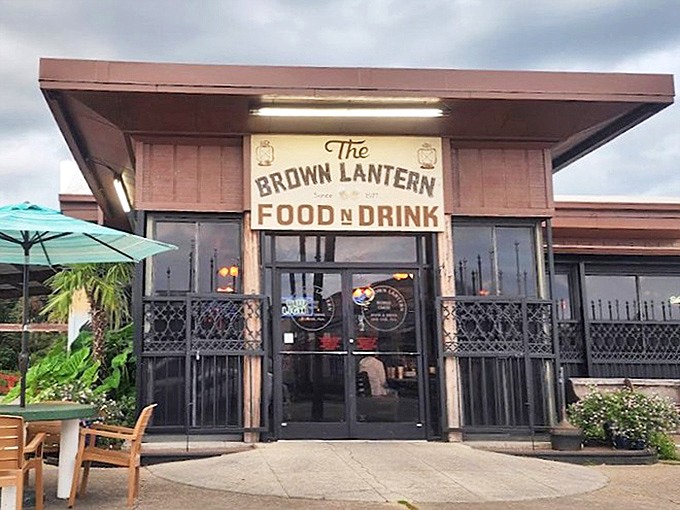The Brown Lantern's entrance beckons hungry travelers with the silent promise of hearty portions and zero pretension.