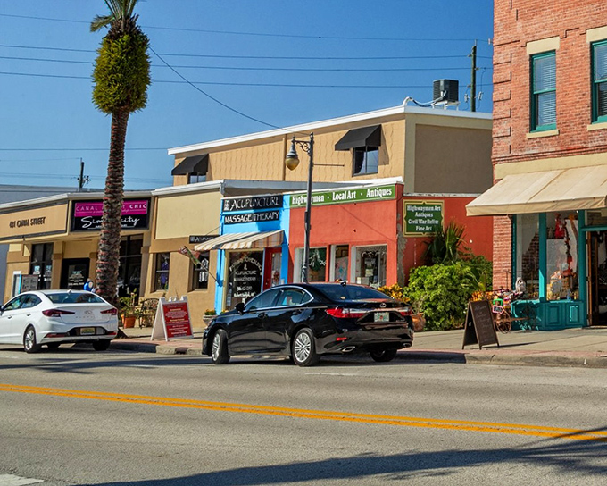 Canal Street's historic district charms with its brick buildings and colorful storefronts, inviting visitors to explore New Smyrna's artistic heart.