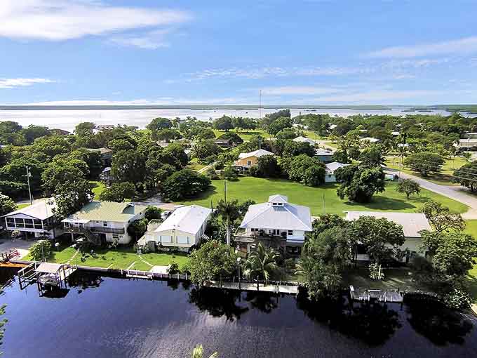Residential streets wind through the island where neighbors know each other's names and houses reflect generations of weathering storms together.