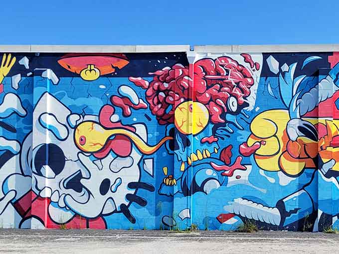 Cartoon characters explode across a wall in primary colors, bringing playful energy that makes even grumpy adults crack a smile, probably unwillingly.