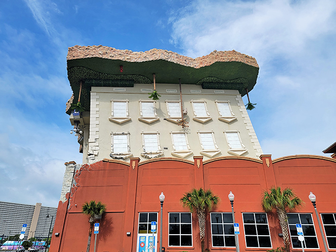 One last look at WonderWorks' impossible architecture reminds visitors they're returning to a world where buildings typically respect gravity's authority.