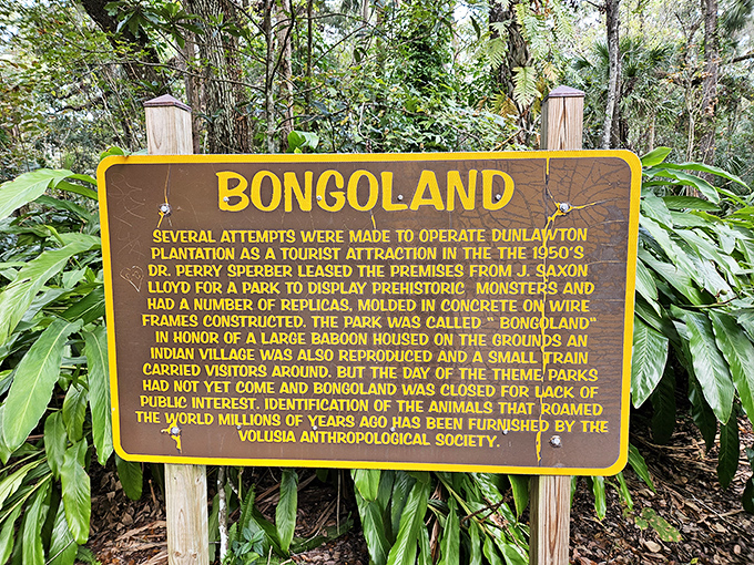 The "Bongoland" sign reveals the park's quirky origin story. When a doctor and circus man team up to create an attraction, you get dinosaurs with sugar on the side.