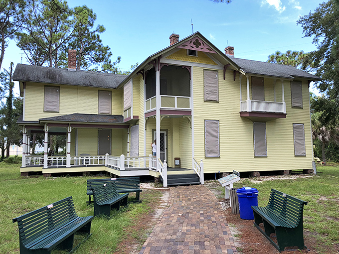 The stately "House of Seven Gables" stands as a yellow sentinel of history, its wraparound porch practically begging for rocking chairs.