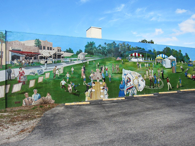 Lake Placid Town Square Mural Community life unfolds in brushstrokes, capturing the timeless charm of small-town gatherings and shared celebrations.
