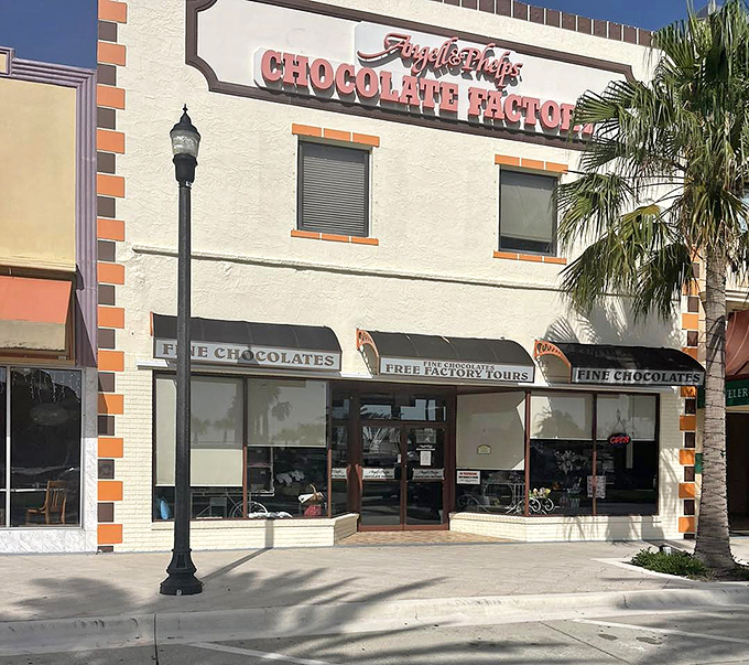 Other Exterior Angle: Palm trees frame this temple of chocolate, proving that paradise exists and it smells like cocoa.